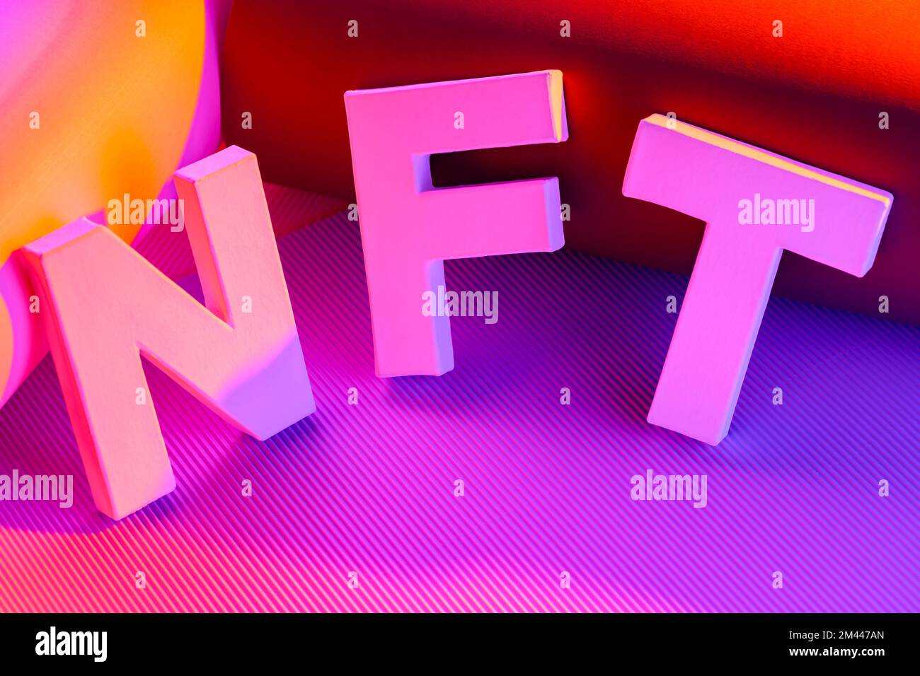 NFT inscription on a colorful neon background. Non-Fungible Token ...