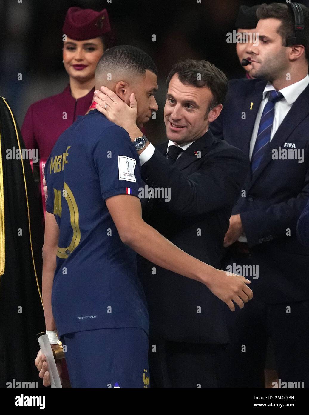 France President Emmanuel Macron (right) consoles France's Kylian ...
