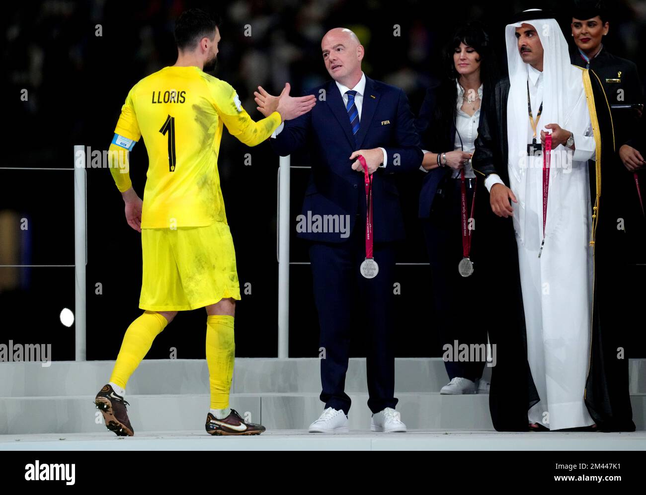 France goalkeeper Hugo Lloris shakes hands with FIFA president Gianni ...