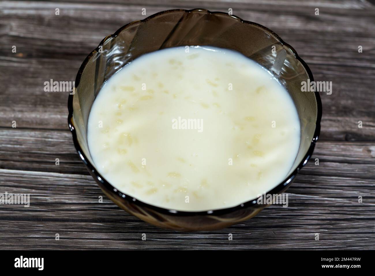 Rice pudding, a dish made from rice, corn flour, sugar mixed with water ...
