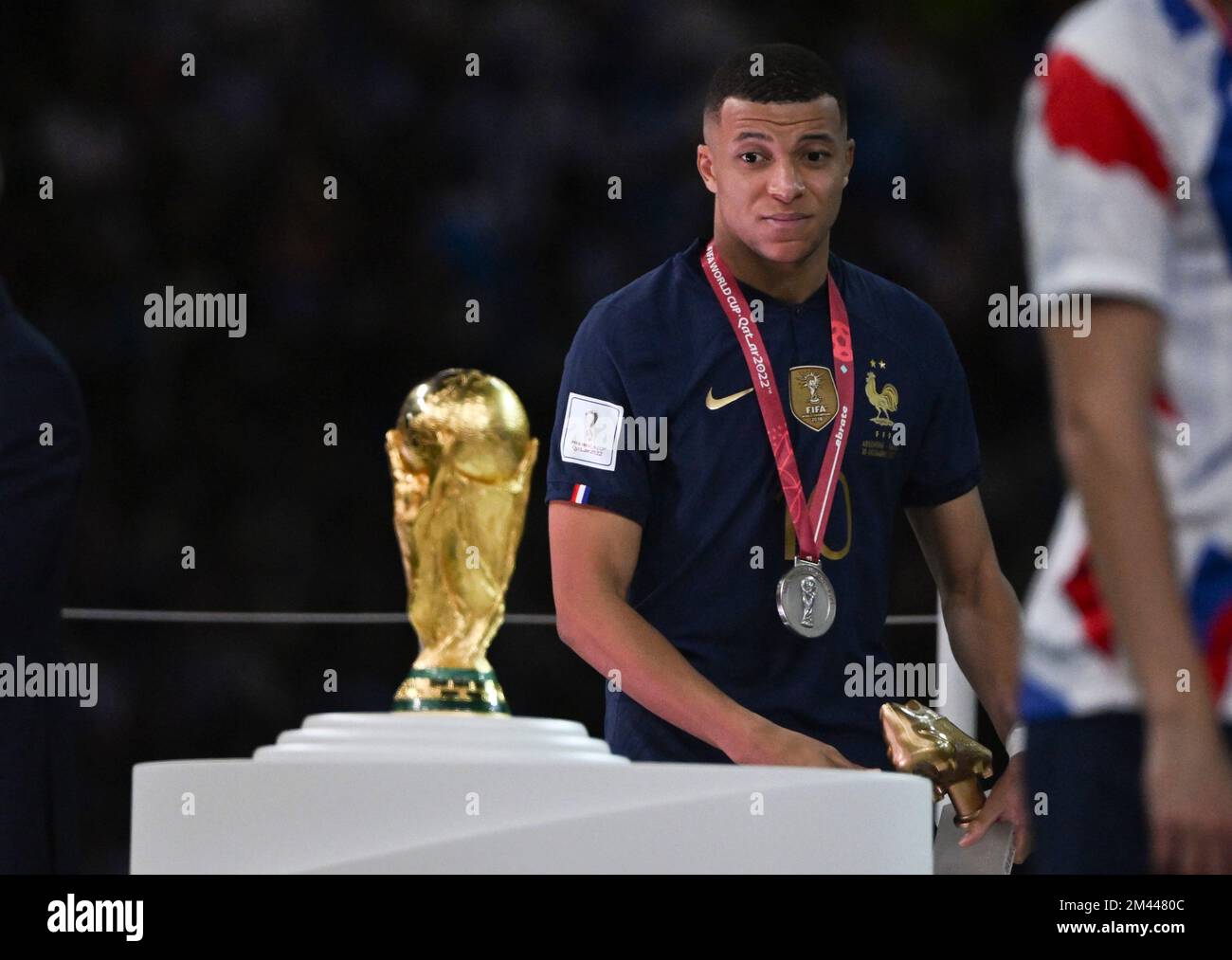 Lusaier, Qatar. 18th Dec, 2022. Kylian Mbappe looks at the FIFA World ...