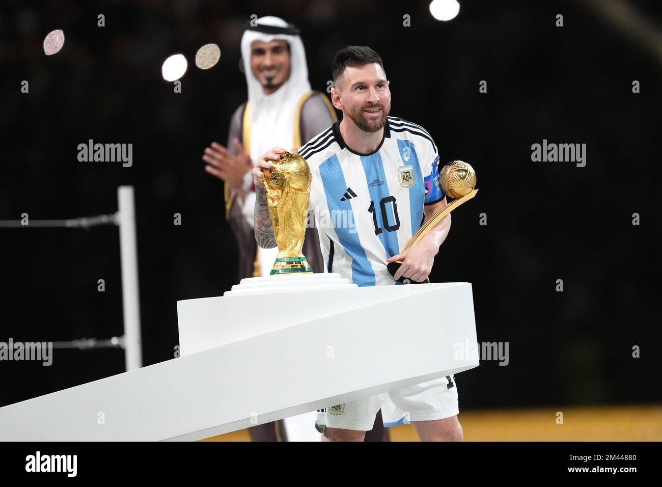 Argentinas Lionel Messi Kisses The Fifa World Cup Trophy While Holding