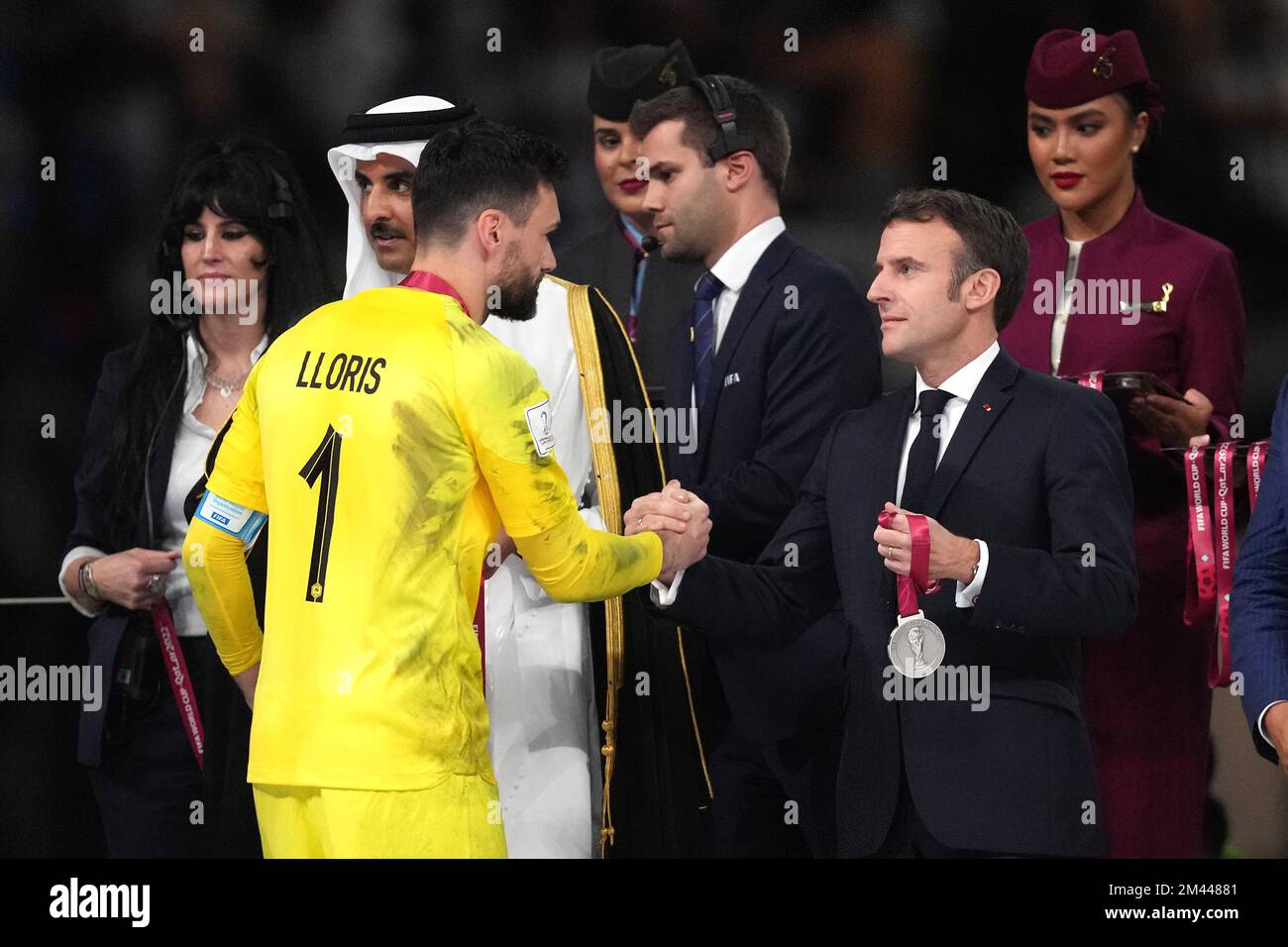 France goalkeeper Hugo Lloris (left) shake hands with France President ...