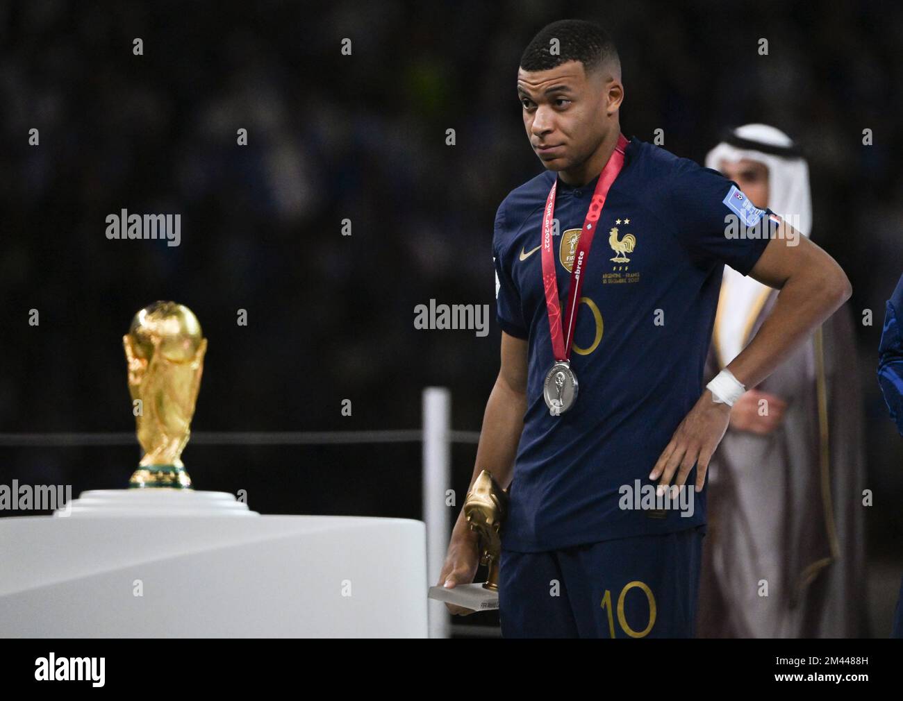 Lusaier, Qatar. 18th Dec, 2022. Kylian Mbappe walks pass the FIFA World ...