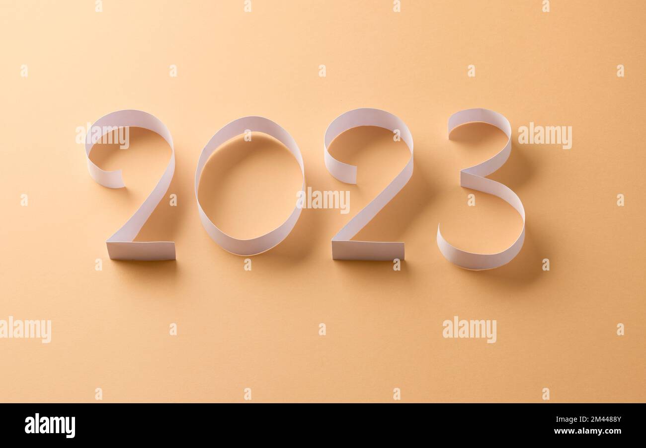 paper numbers two zero two three on yellow background Stock Photo - Alamy