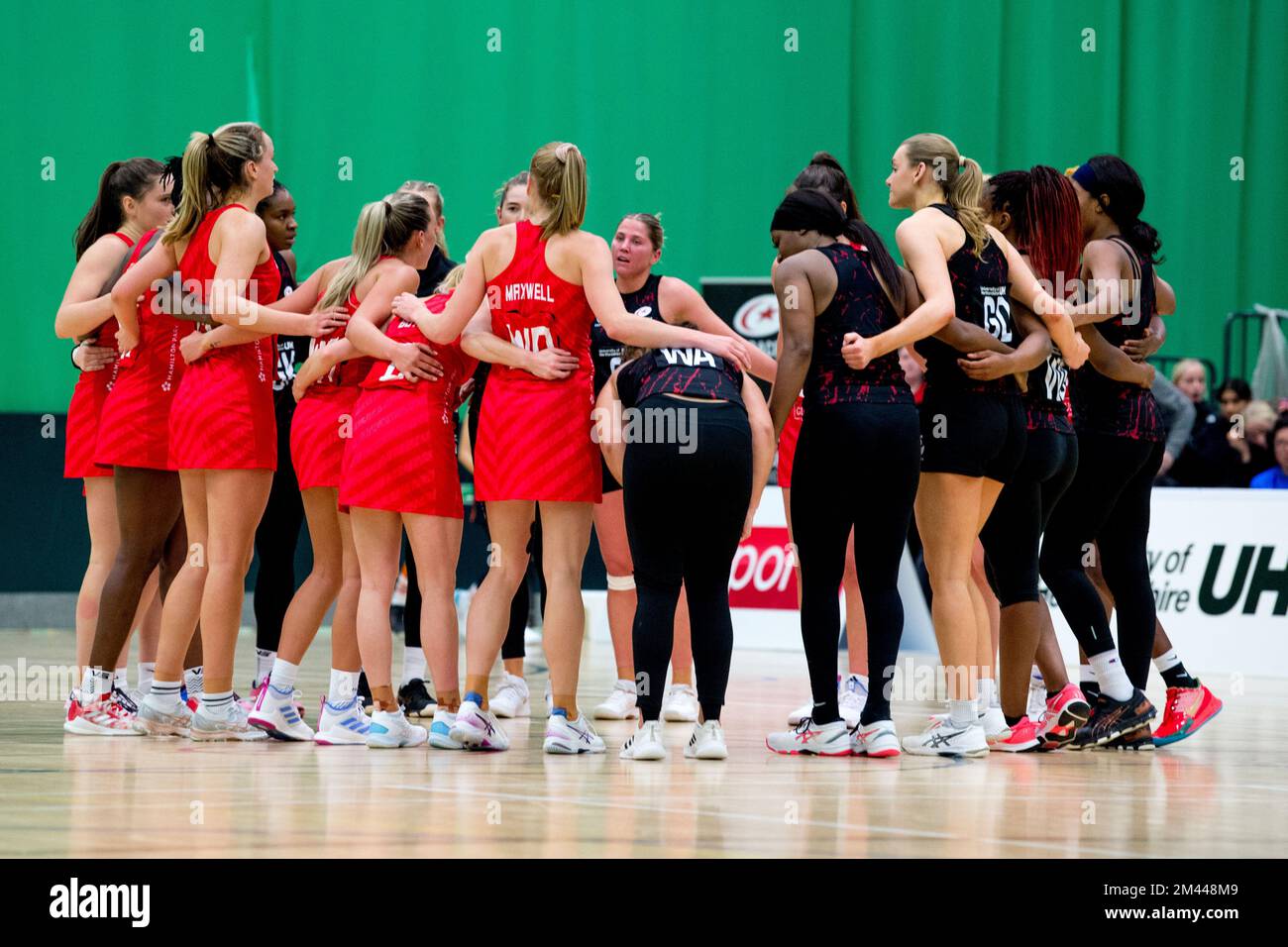 Hertfordshire, Herts on 18 December 2022. The teams gather at the end ...