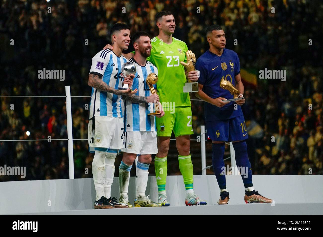Lionel Messi and Emiliano Martinez and Enzo Fernandez of Argentina and Kylian Mbappe of France ...