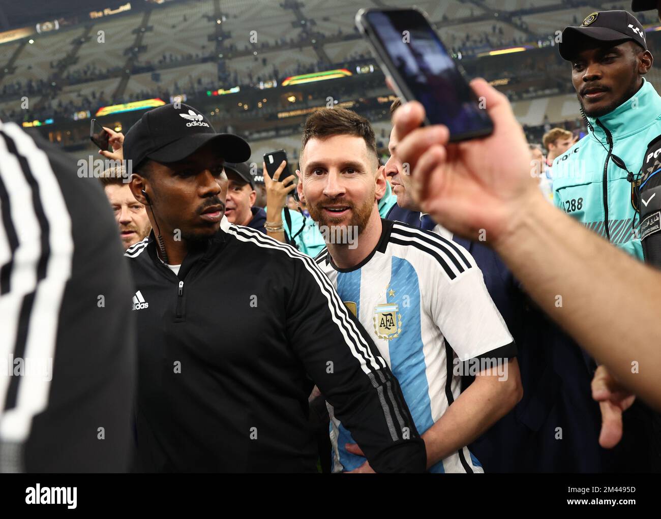 Doha, Qatar, 18th December 2022. Lionel Messi of Argentina is protected ...