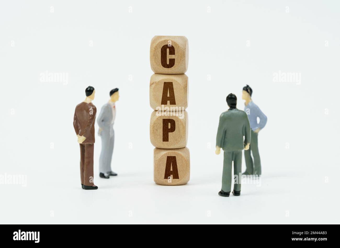 Business and finance concept. On a white background, figures of ...