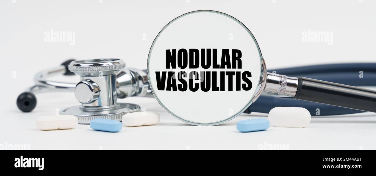 Medicine and health concept. On a white surface are pills, a ...