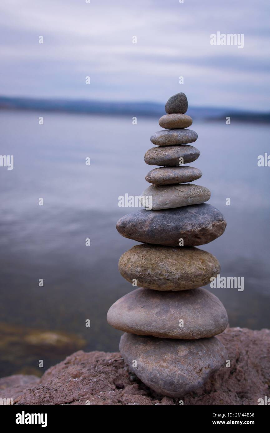 stack of stones on the beach. Various stones top view on the beach ...