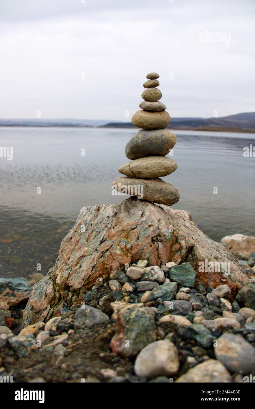 stack of stones on the beach. Various stones top view on the beach ...