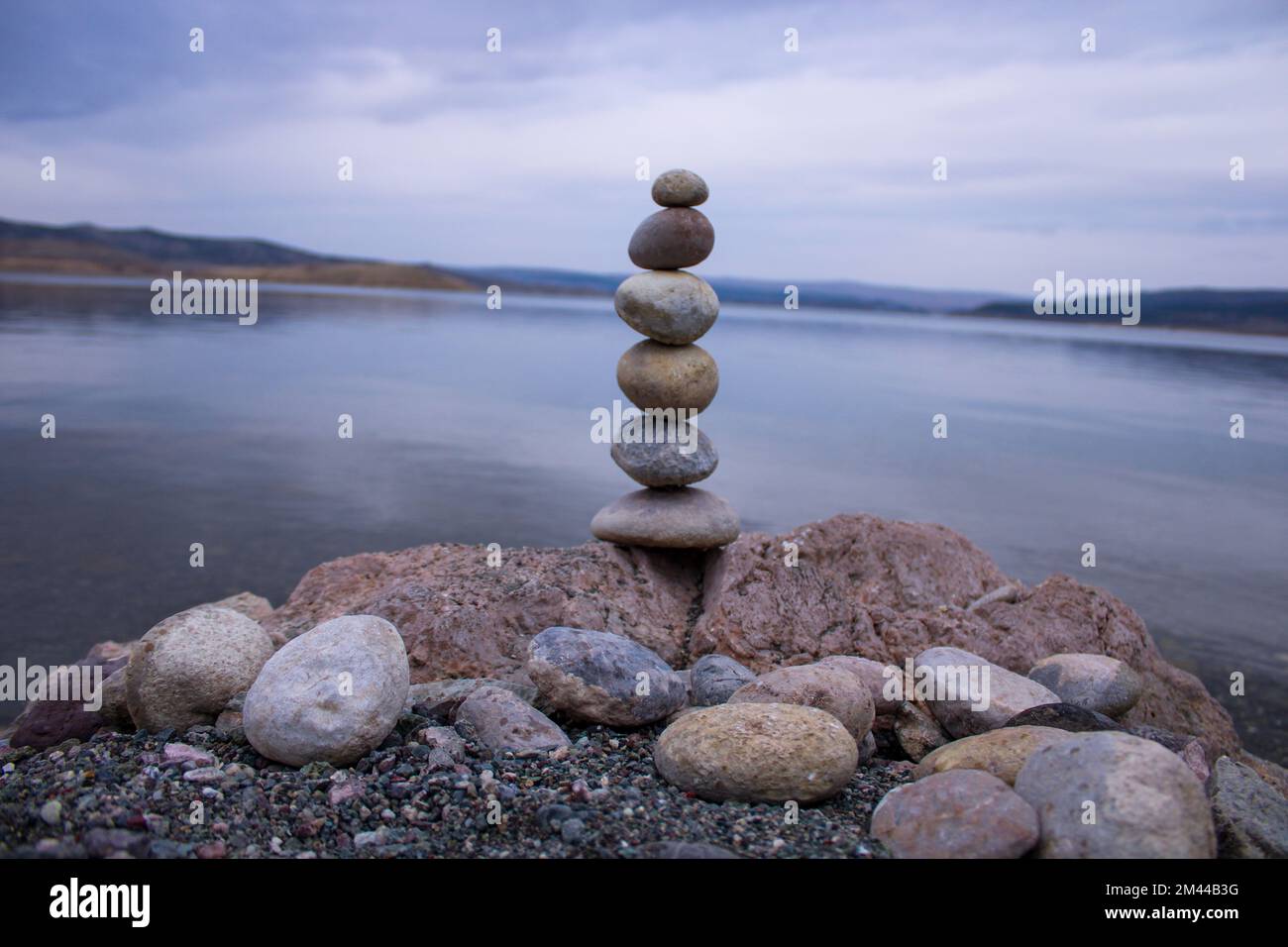 stack of stones on the beach. Various stones top view on the beach ...