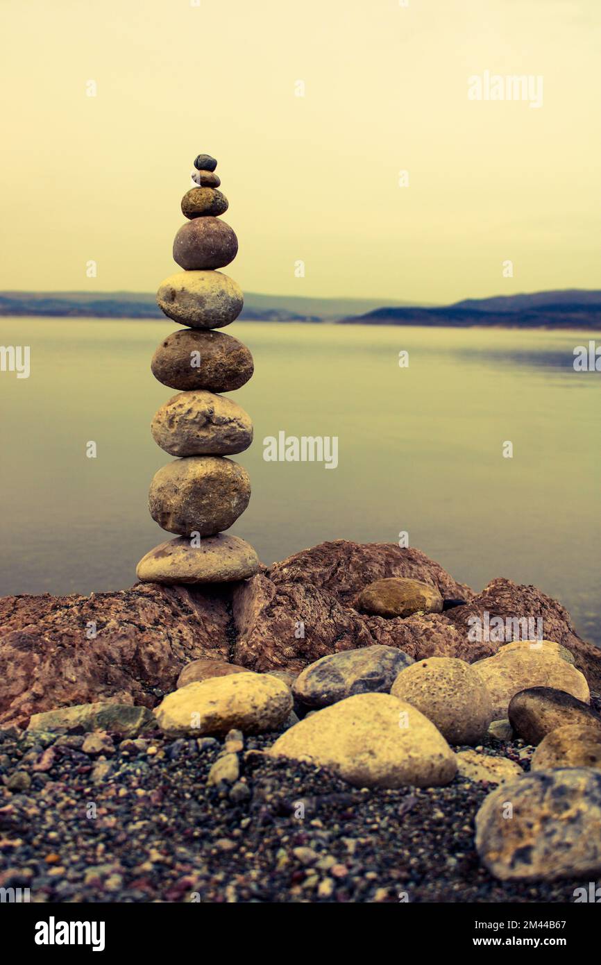 stack of stones on the beach. Various stones top view on the beach ...
