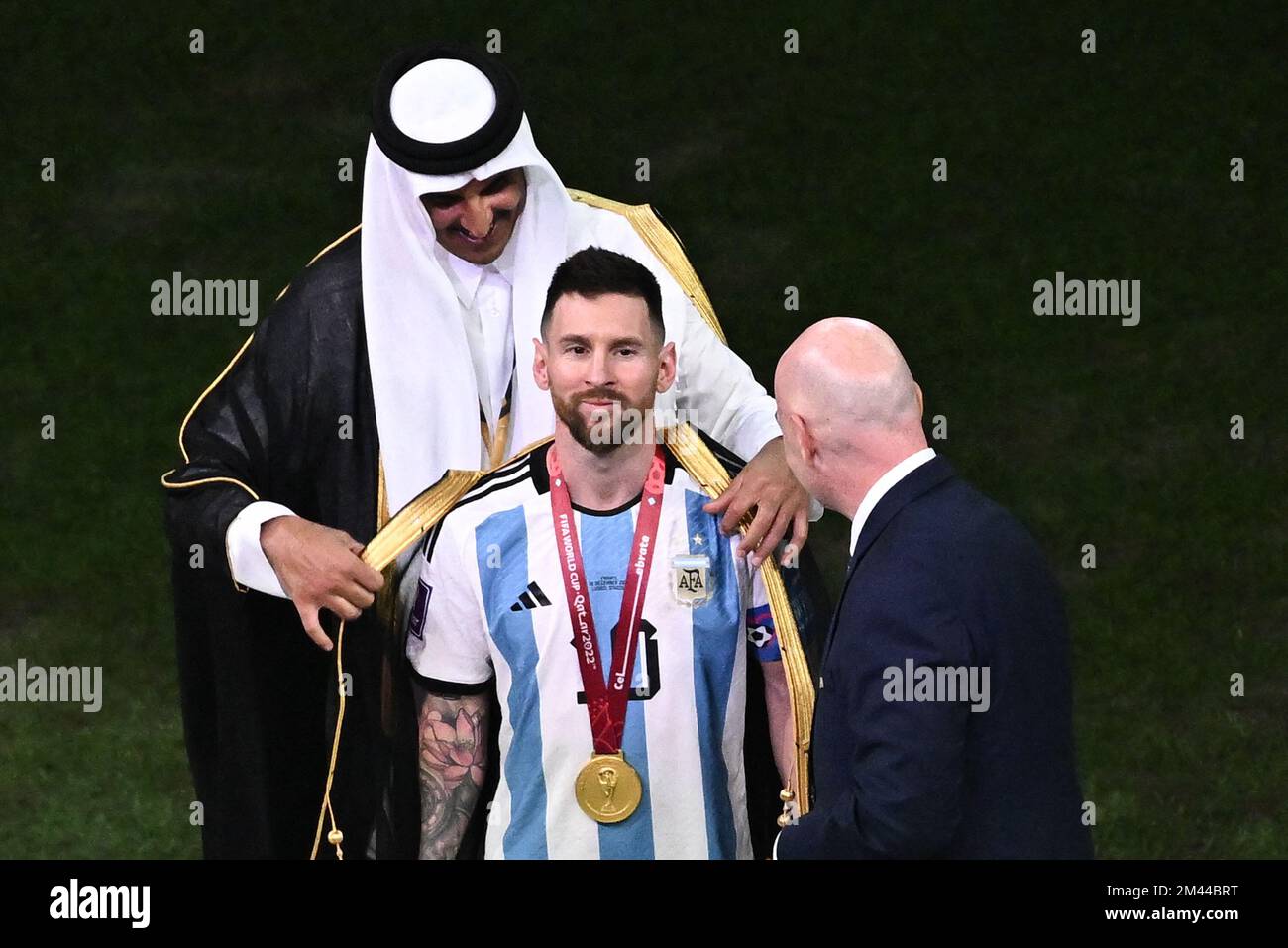 Doha, Qatar on December 18, 2022. Lionel Messi of Argentina receives a ...