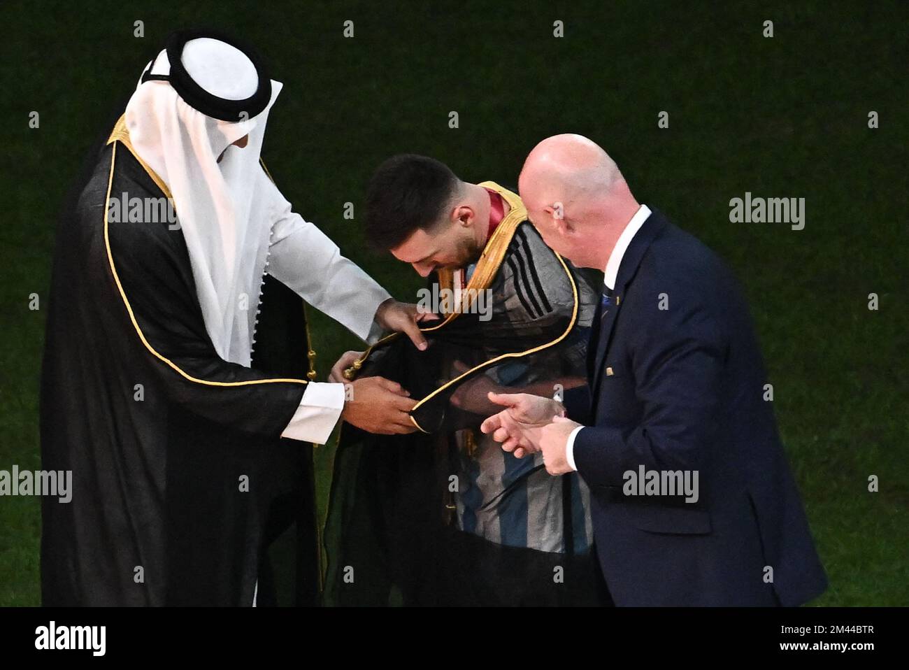 Doha, Qatar on December 18, 2022. Lionel Messi of Argentina receives a ...