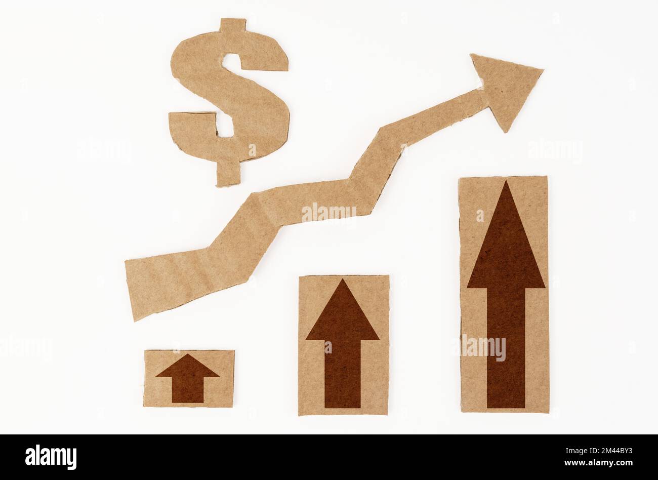 The concept of economic growth. On a white surface, a graph with up ...