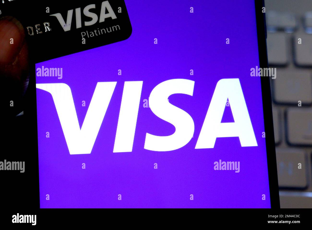 In this photo illustration, VISA Debit Card held in front of a Visa ...