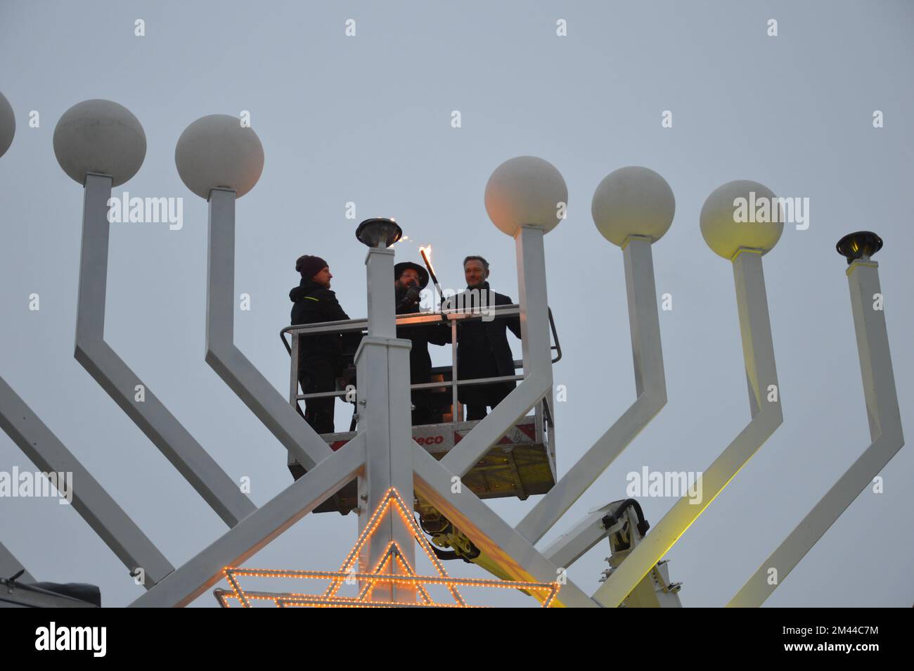 Berlin, Germany - December 18, 2022 - First light of huge Hanukkah ...