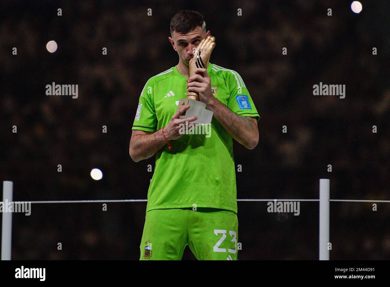 LUSAIL CITY, QATAR - DECEMBER 18: Emiliano Martinez of Argentina kisses ...