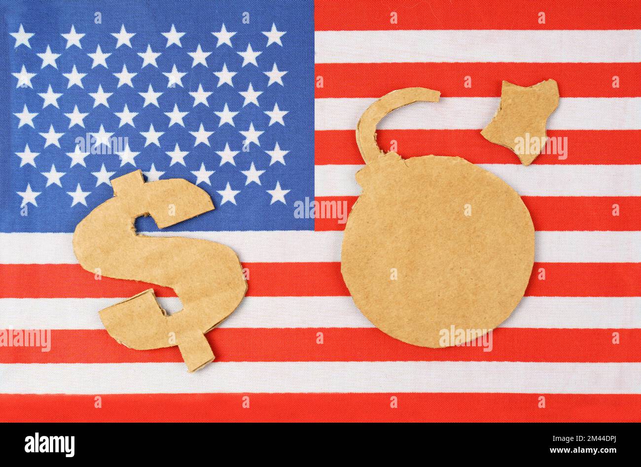 Concept of economic crisis. On the flag of the United States lies a ...