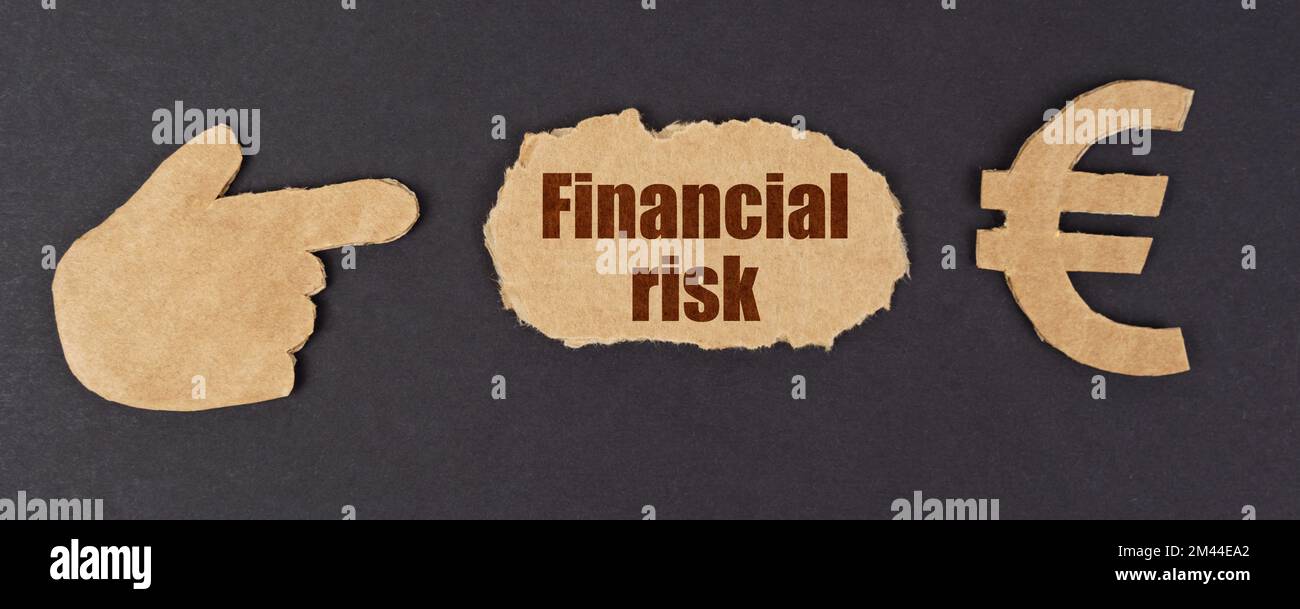 Economy and finance concept. On a black surface, a figure of a hand, a ...