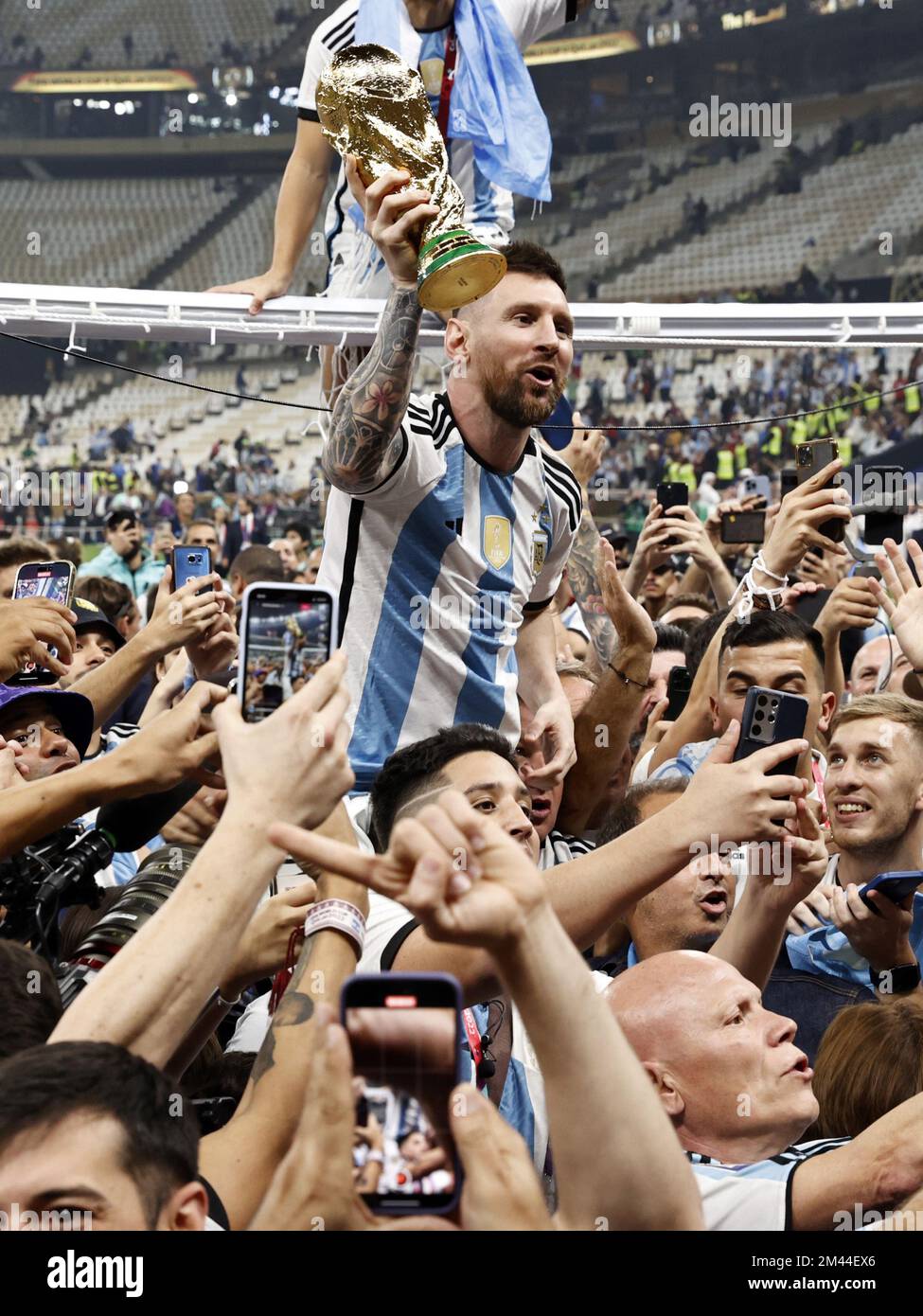 AL DAAYEN - Lionel Messi of Argentina on the shoulders with the world ...