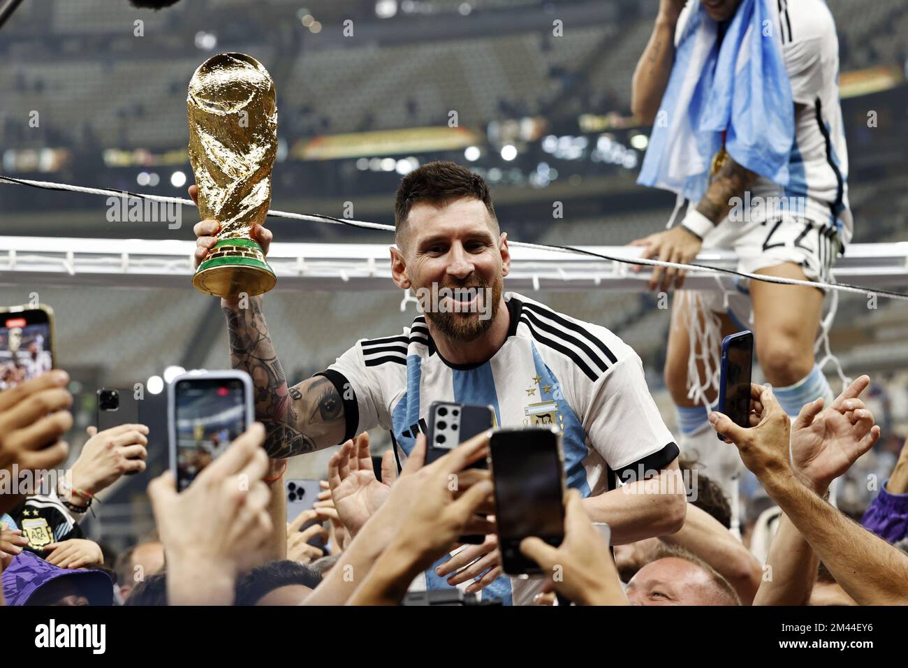 AL DAAYEN - Lionel Messi of Argentina on the shoulders with the world ...
