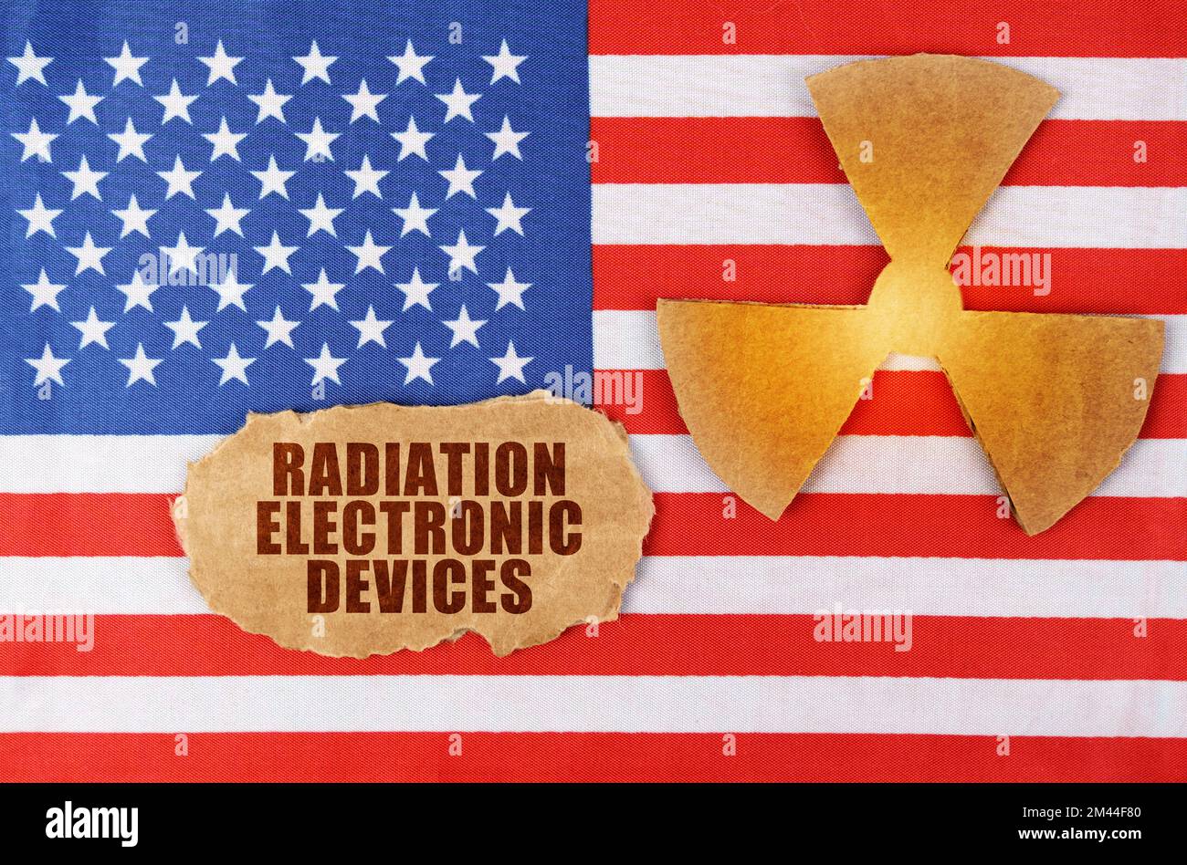 Industry and radiation concept. On the flag of the United States, there ...