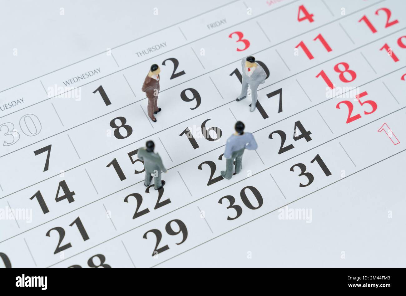 Business and finance concept. There are miniature figures of ...