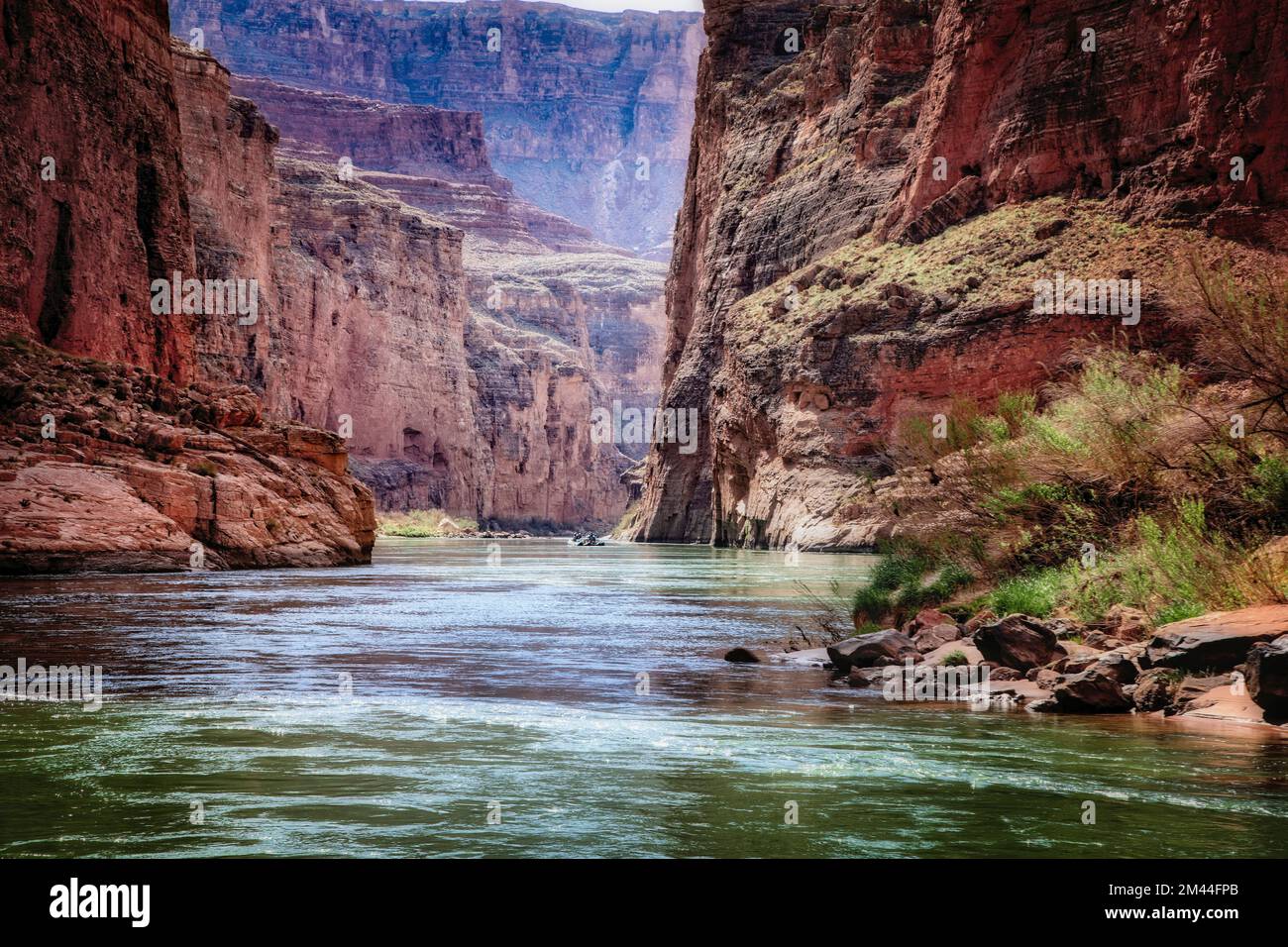 Rafting Downstream From Red Wall Cavern Along The Colorado River Grand