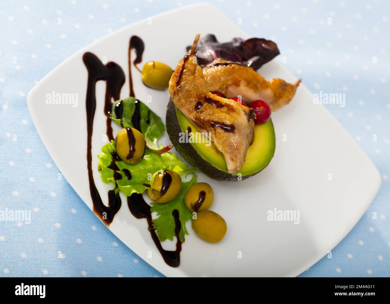 Ptarmigan legs with vegetables Stock Photo - Alamy