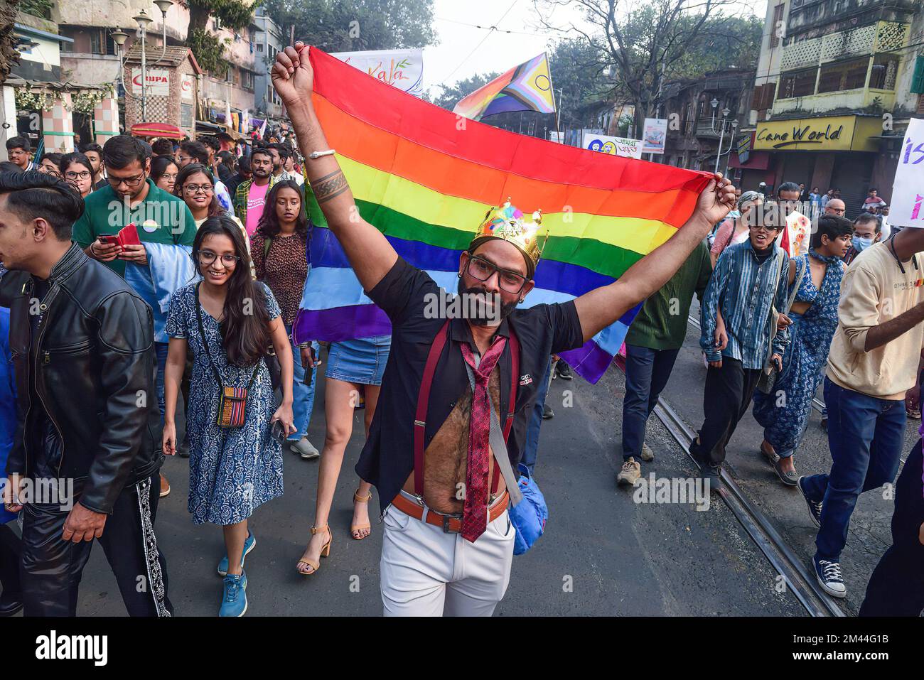 A participant holds a rainbow flag during the Kolkata Rainbow Pride ...