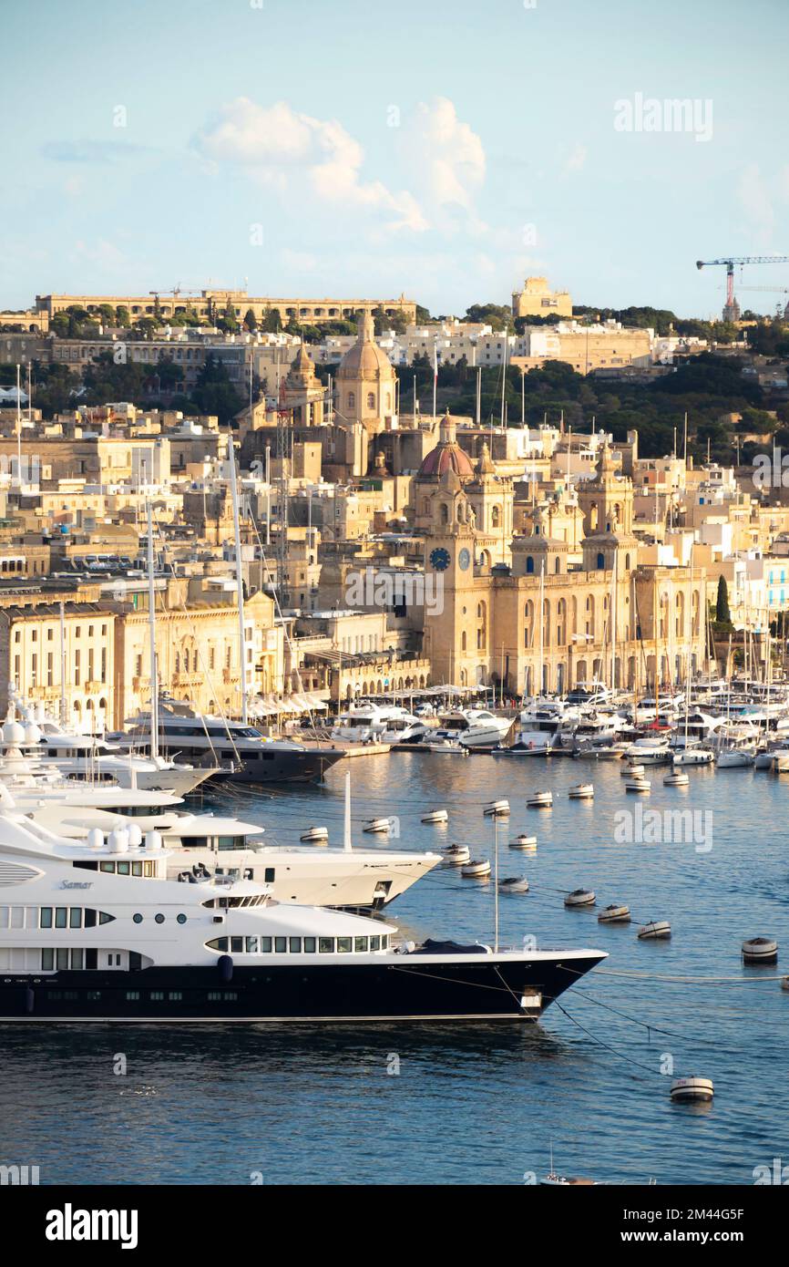 Birgu, Malta - November 13, 2022: Cityscape with stone facades shining ...