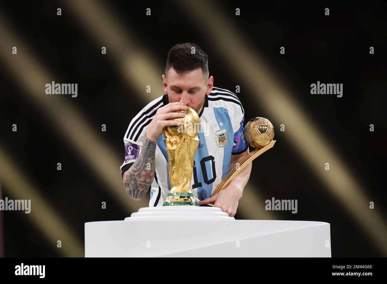 Lusail, Qatar. 18th Dec, 2022. Lionel Messi of Argentina kisses the ...