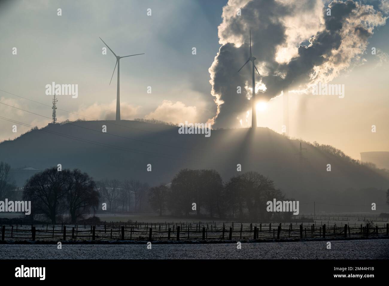 Wind farm Halde Oberscholven, clouds of smoke from the cooling tower ...