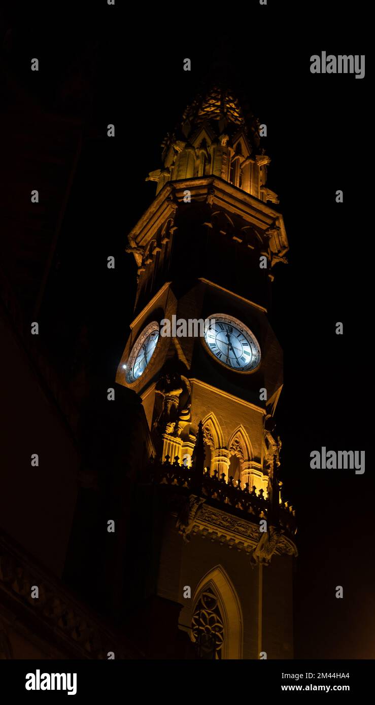 Bell tower clock of the church of the Majorcan town of Manacor at night ...