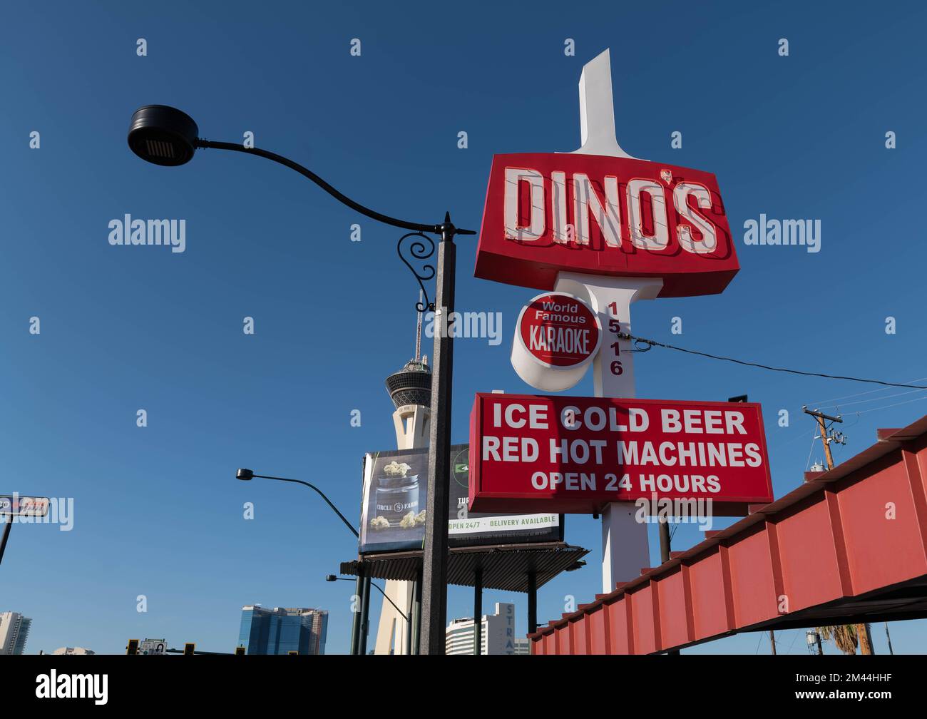 A low-angle shot of the Dinos retro bar billboard in Las Vegas, Nevada ...