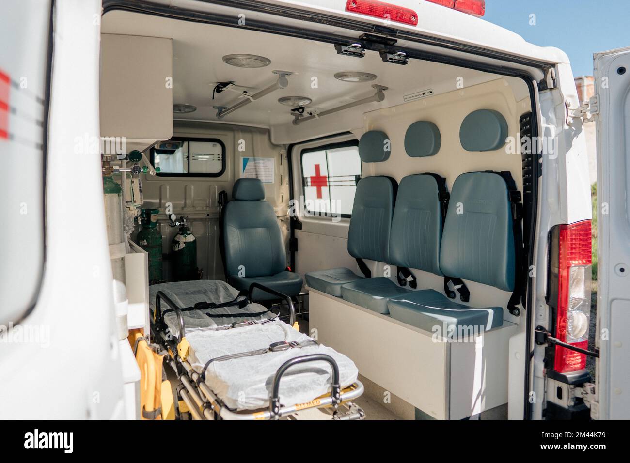 A closeup shot of the open back door of ambulance and showing the ...