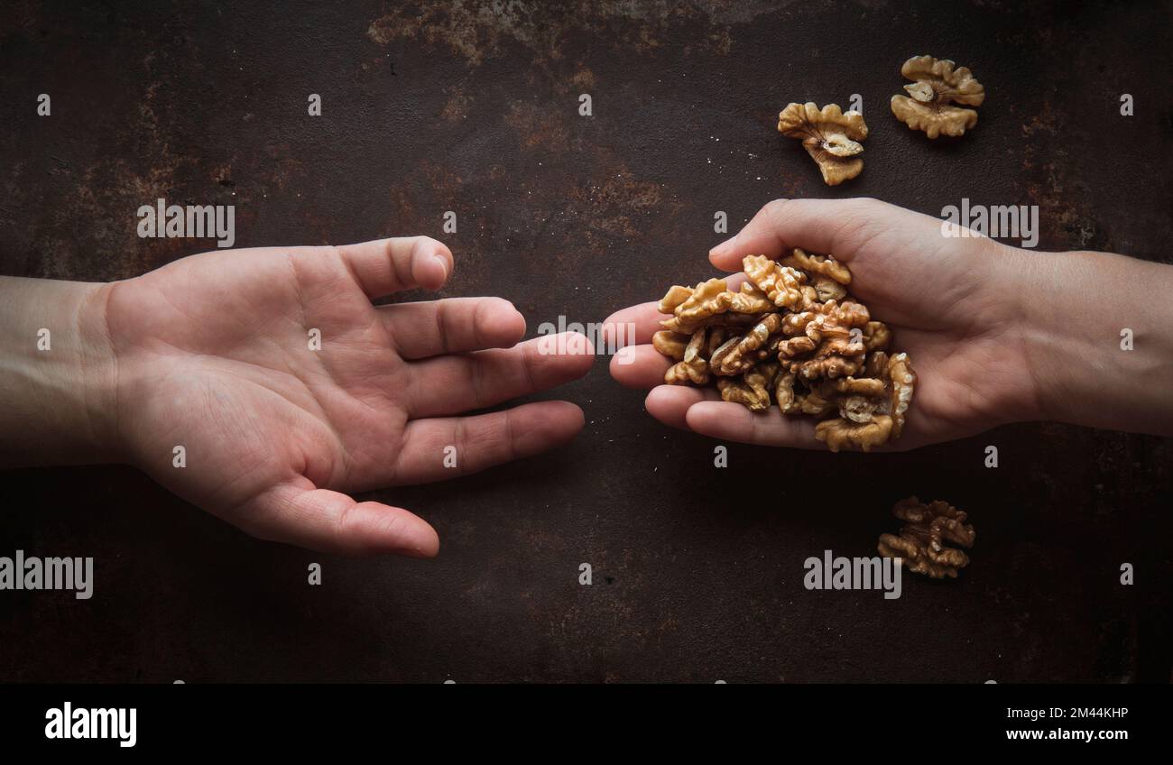 Human hands on rusty hi-res stock photography and images - Alamy