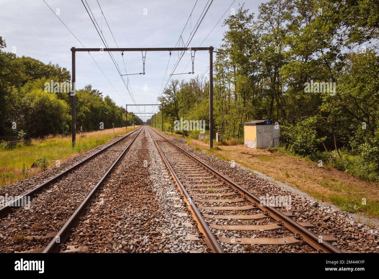 wired railway landscape tracks perspective sunny day in the countryside ...