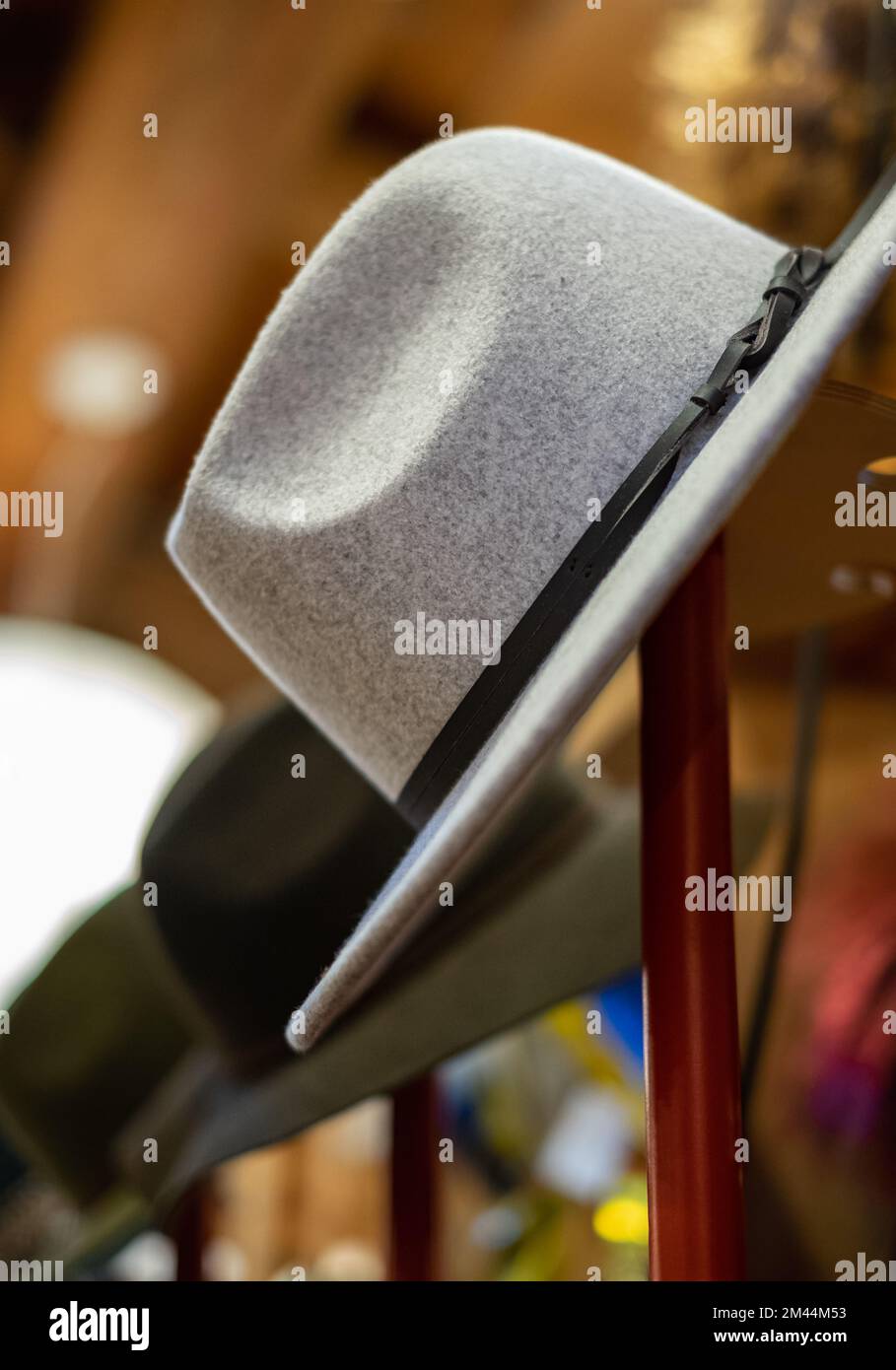 Hats are on store shelves. Rows of multi-colored textile fabric panama ...