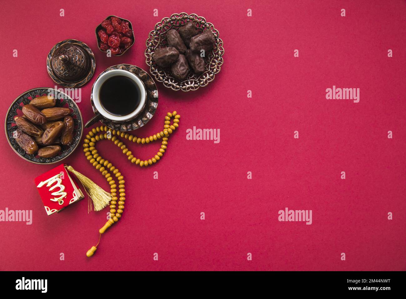 Coffee cup with dates fruit beads Stock Photo - Alamy