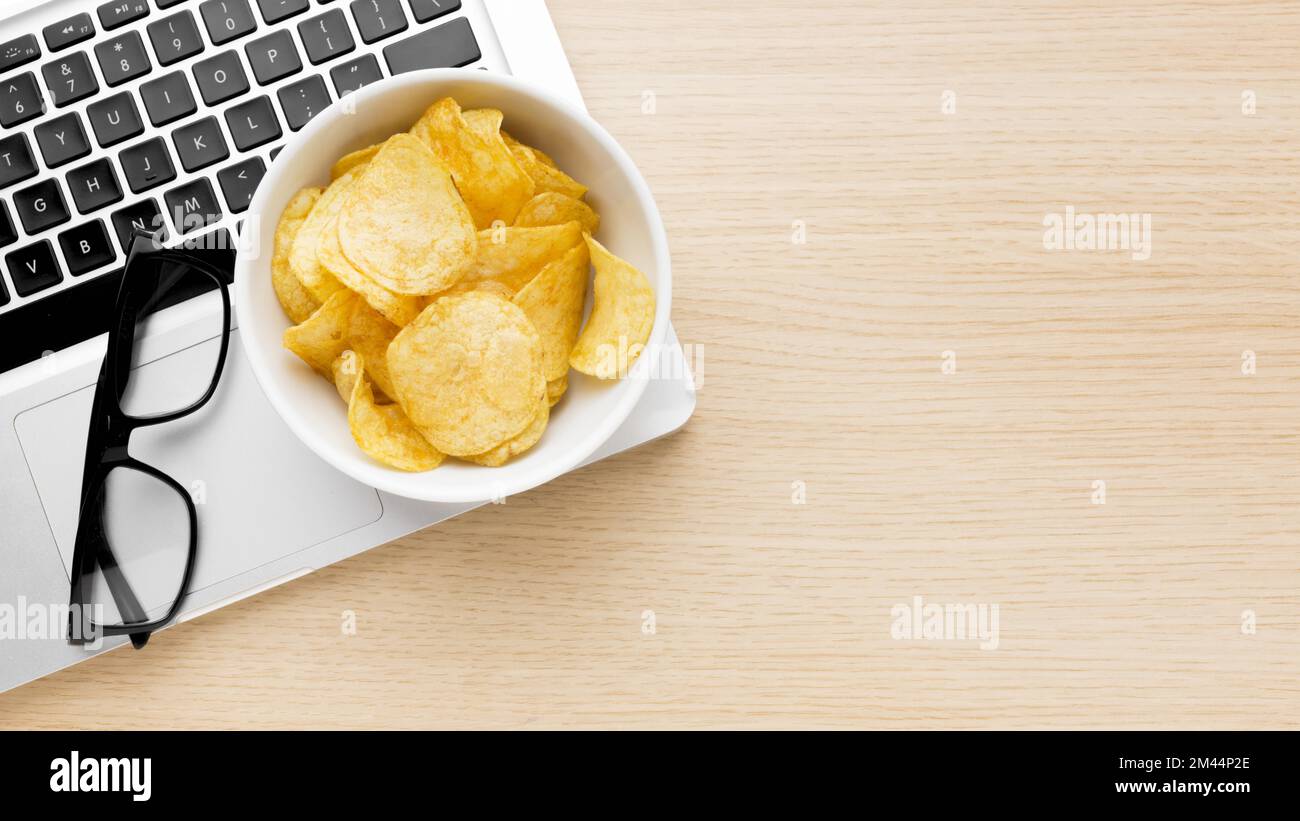 Copy space bowl with chips Stock Photo - Alamy