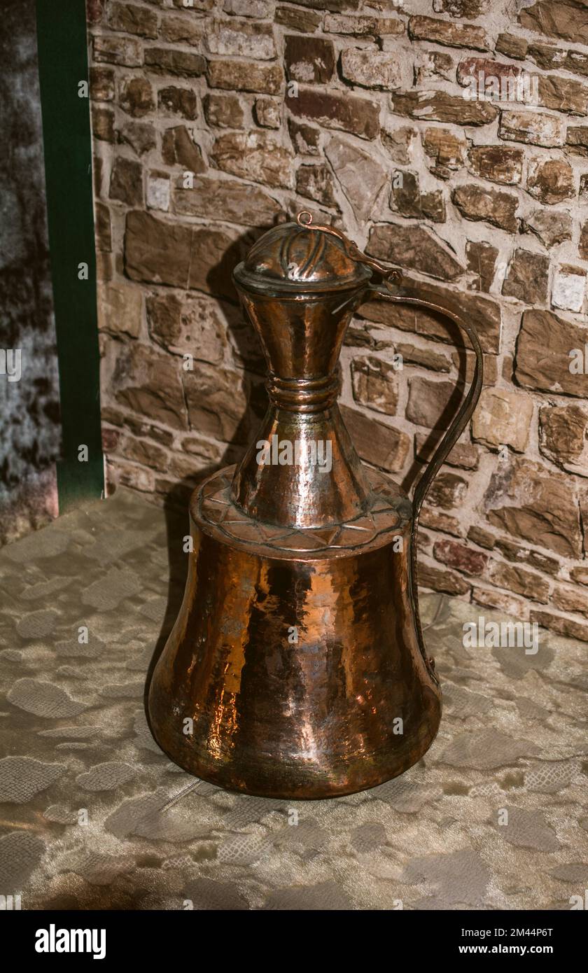 Very old style metal ewer water jar in view Stock Photo - Alamy