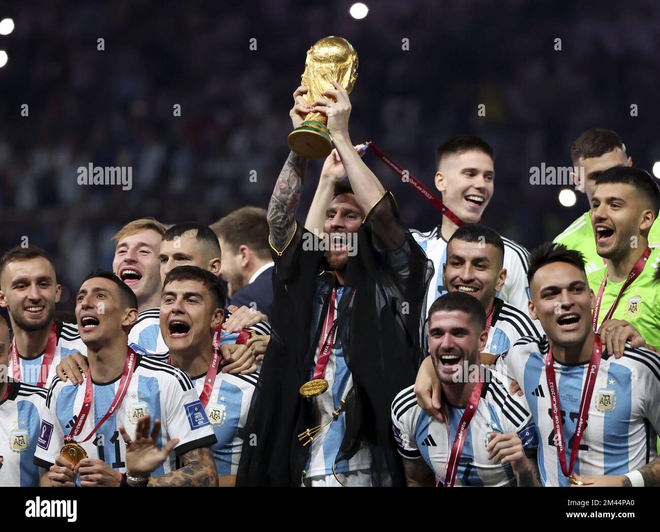 Al Daayen, Qatar - December 18, 2022, Lionel Messi of Argentina holding the World Cup and ...