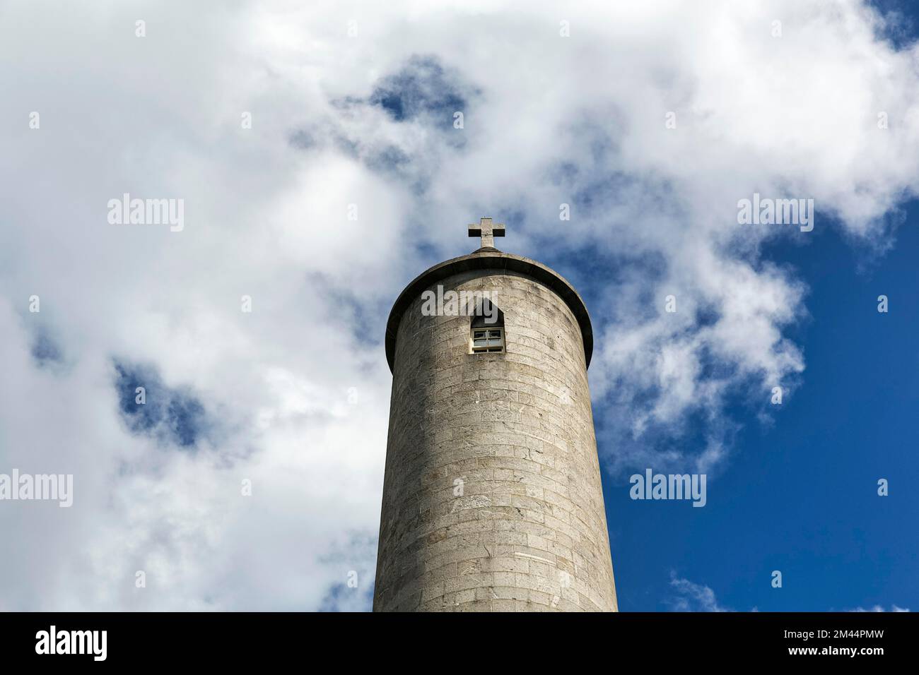 Round tower with stone cross, restored OConnell Tower, Glasnevin ...