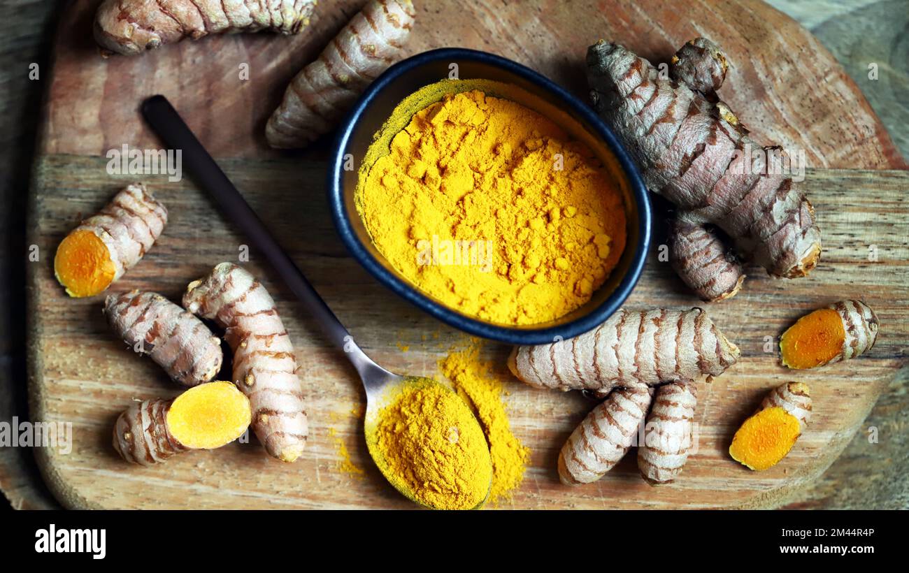 Turmeric. Turmeric root. Powder turmeric seasoning Stock Photo - Alamy
