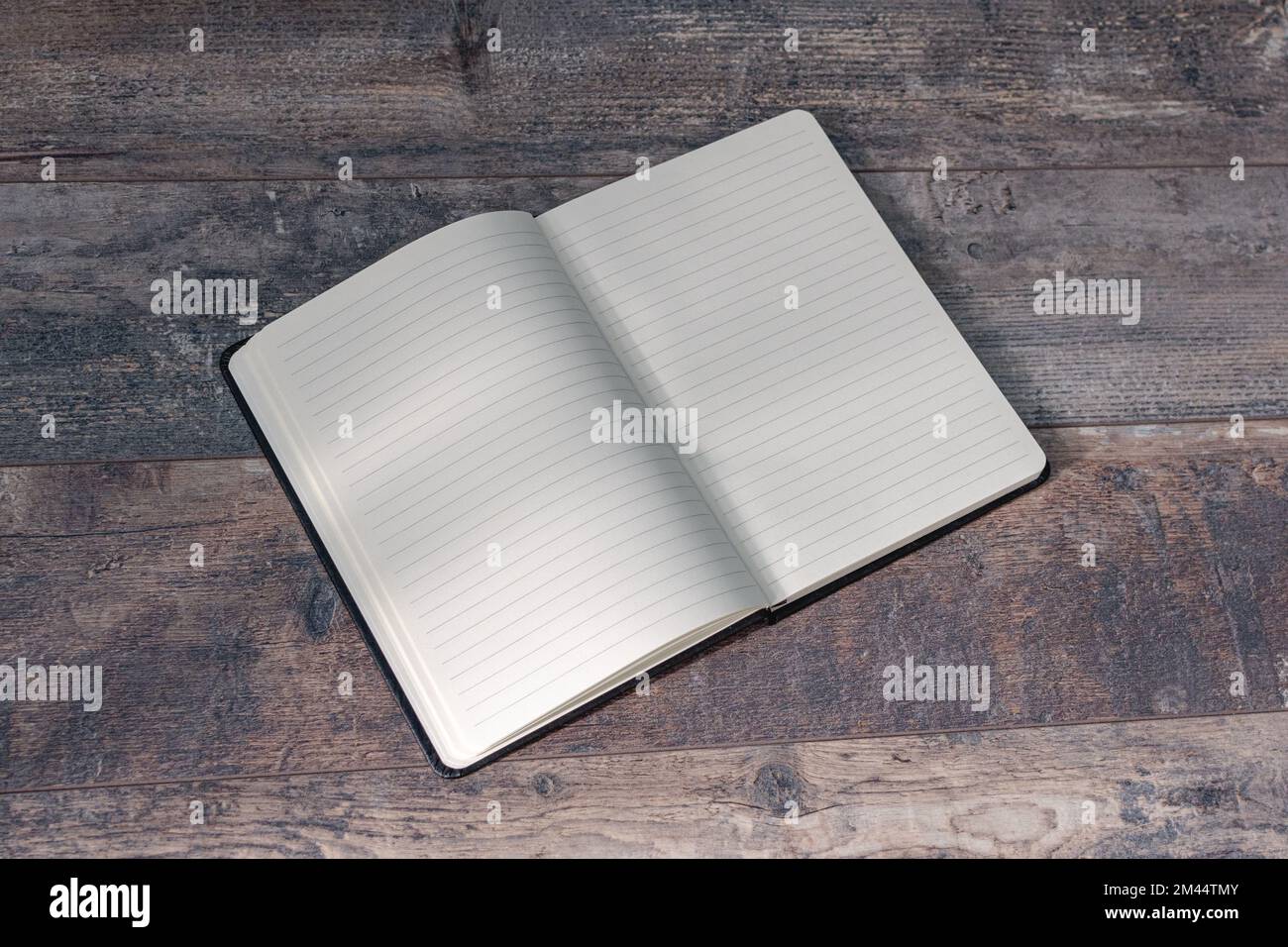 Old notebook with blank pages for text. On an old texture table. Early ...