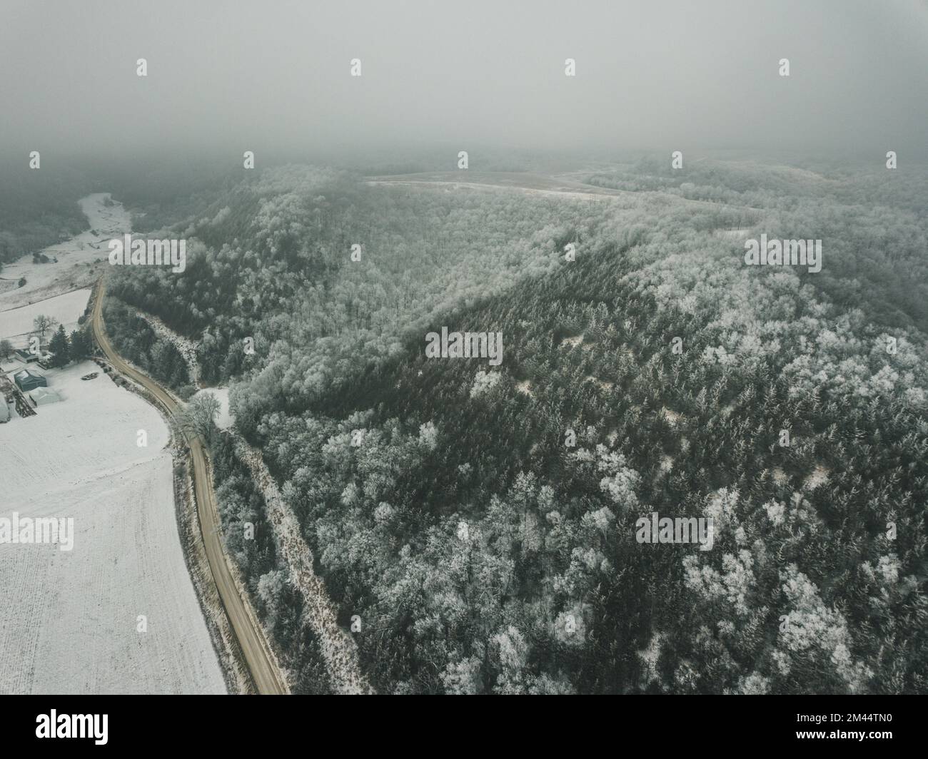 Snowy winter landscape scene in the midwest bluffs Stock Photo - Alamy